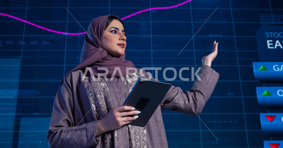 Reading the news brief using a tablet, a Saudi Gulf Arab broadcaster ...