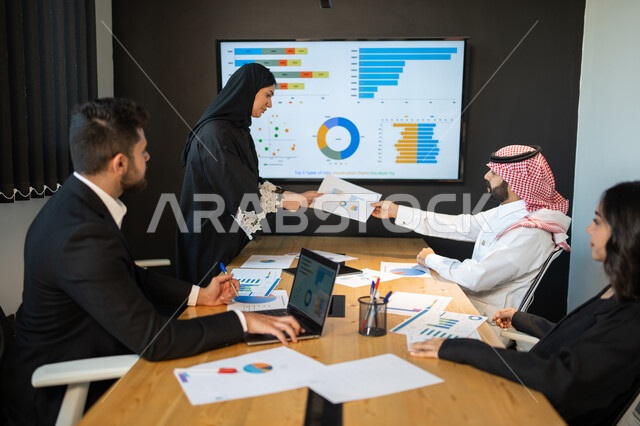 Members of an Arab Gulf Saudi team hold a meeting to study and analyze ...