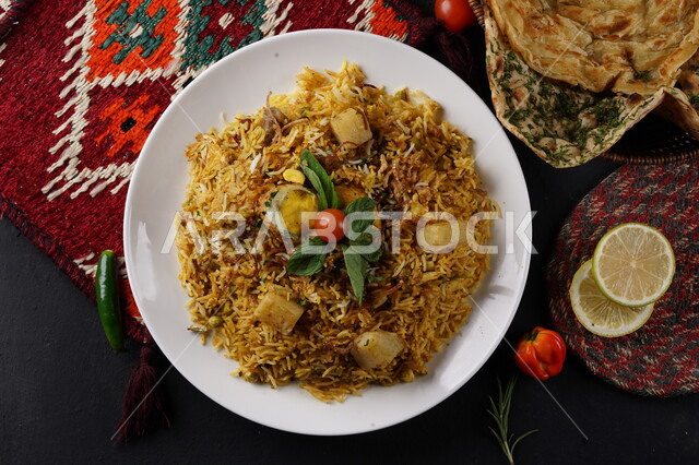 Saudi cuisine meals, bukhari rice with buried chicken, biryani rice ...