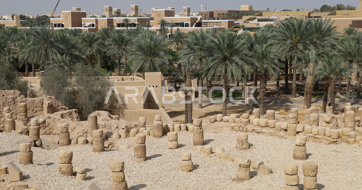 Green palm trees in broad daylight, the historic Al-Turaif neighborhood ...