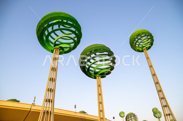 Artistic sculptures in the form of green trees in Irqah roundabout at ...