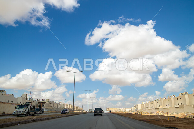 Suburbs and villages on the sides of the land travel road between ...