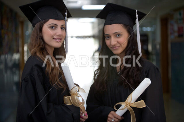 Celebrating university graduation with gestures of happiness and joy ...