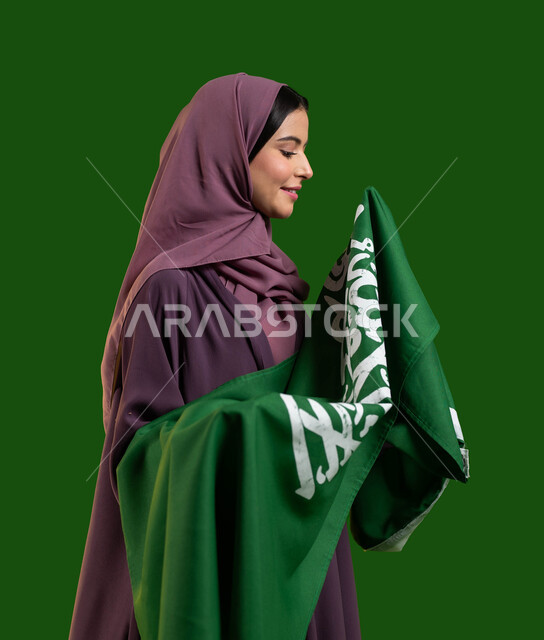 Showing love and loyalty to the state, a side portrait of a veiled ...