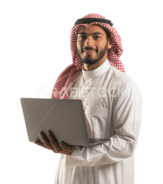 Using modern technical devices, a portrait of a smiling Saudi Arabian ...
