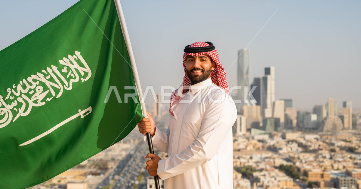 Anniversary of the Saudi National Day 93, a close-up of a smiling Saudi ...