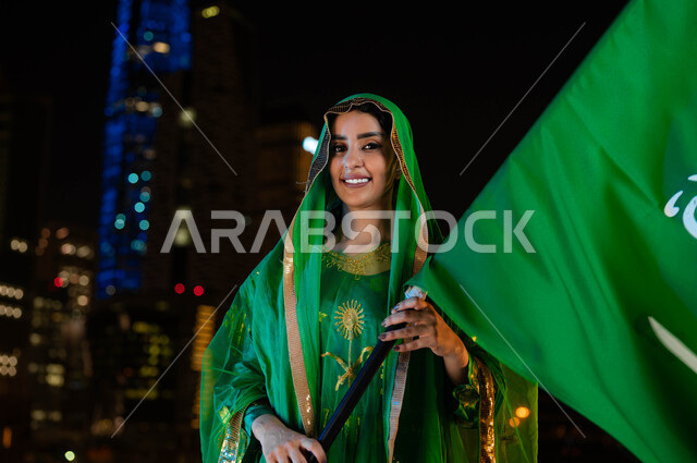 Looking at the camera, commemorating the Saudi National Day, September ...
