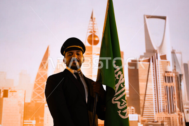 Gestures of pride in the nation’s achievements, a close-up of a Saudi ...