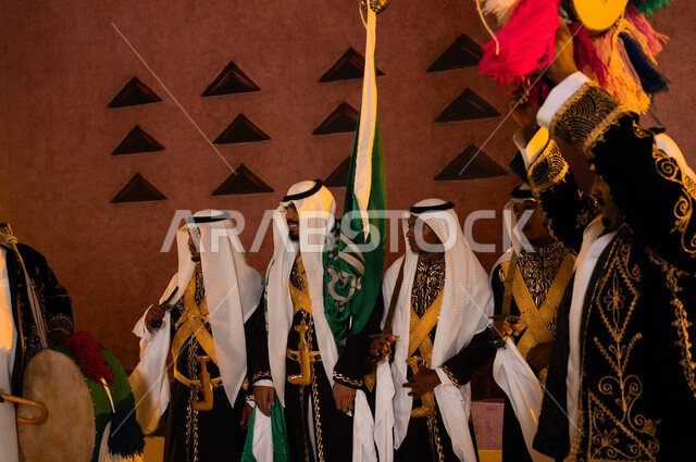 The Hijazi Ardah, songs, and folk dancing with swords in front of the ...