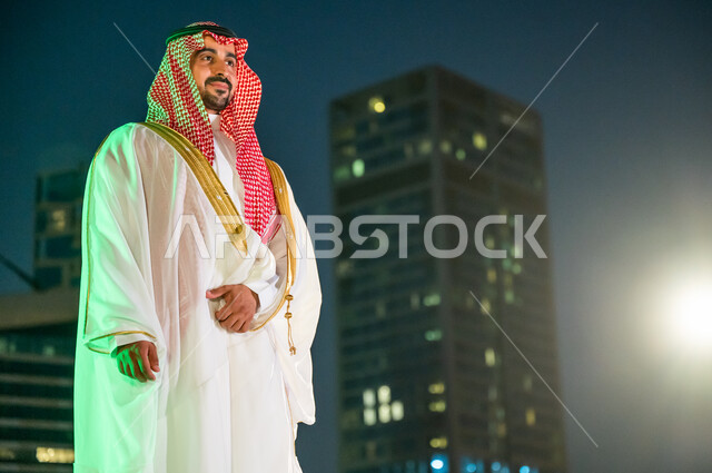 Skyscrapers and towers illuminated at night in the city of Riyadh ...