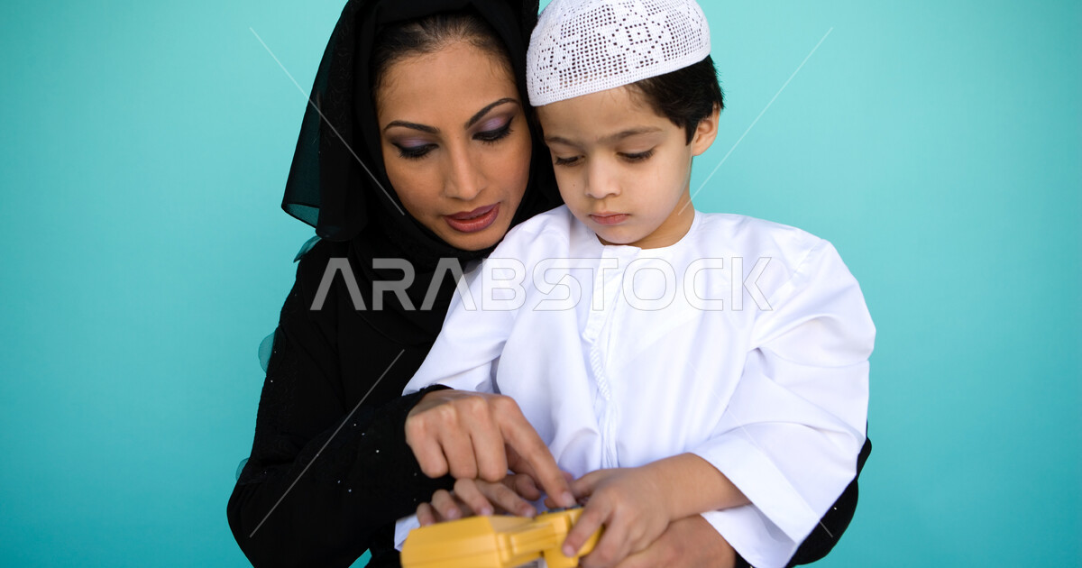 Entertainment Video Games, Portrait of an Arab Gulf Emirati boy wearing ...