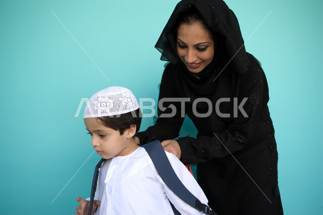 Wearing the Emirati school uniform, a portrait of an Emirati Arab-Gulf ...