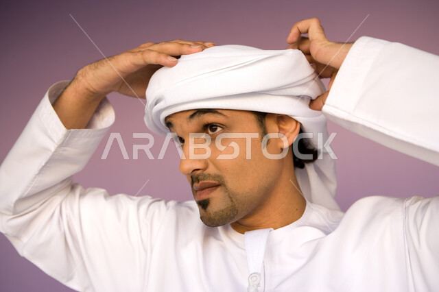 Wearing the Emirati kandura and the turban, caring about the external ...