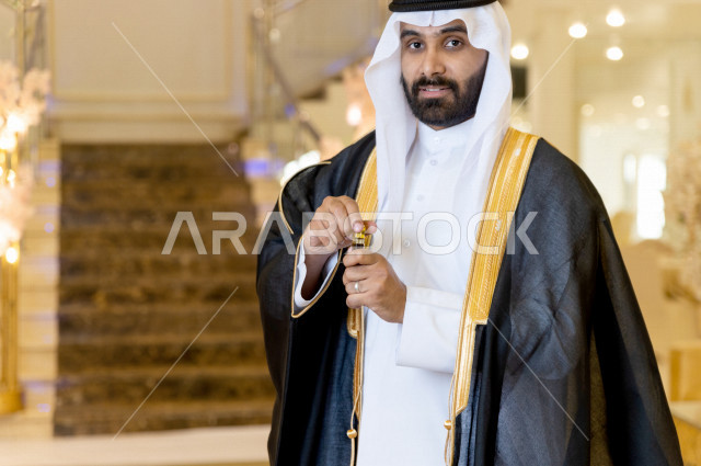 A young Saudi Arabian bridegroom in the Gulf for a photo session at his ...