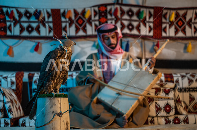 Love of owning and raising birds of prey, preserving artistic cultural ...