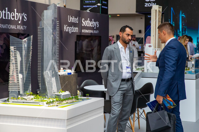 Answering questions from visitors to the Sotheby’s International Real ...