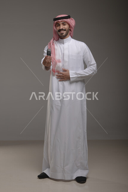 Gestures of happiness and pleasure in owning a new car, portrait of a ...