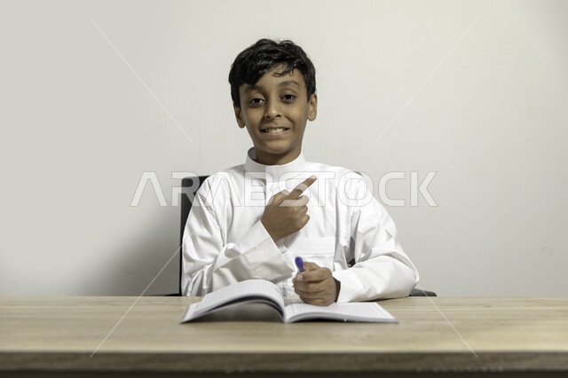 Developing and developing writing skills, looking at the camera and ...