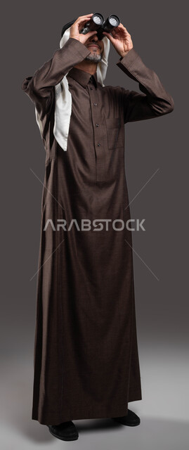 Love of adventure and exploration, looking through binoculars to see ...