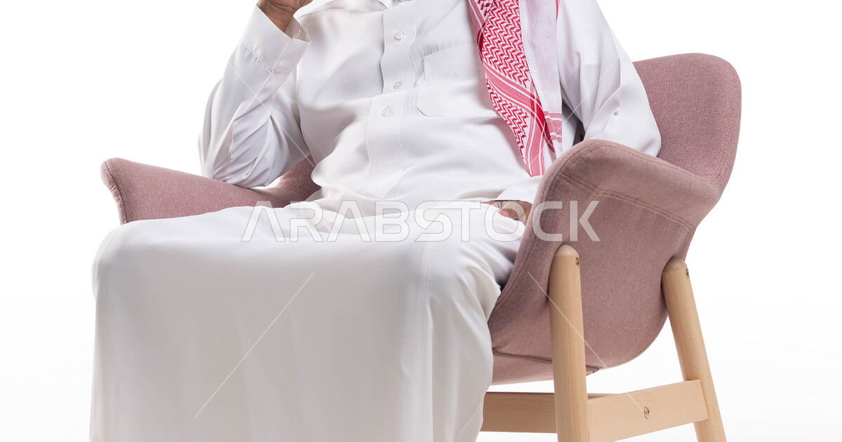 Solving problems and making decisions, portrait of an elderly Saudi ...