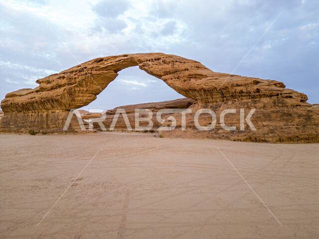 The famous Arch Rock in the desert areas of the Kingdom of Saudi Arabia ...