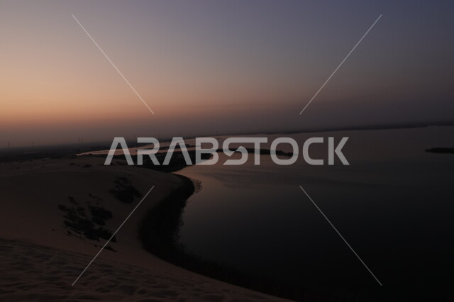 Lakes in the midst of sand dunes in the desert of the Kingdom at the ...