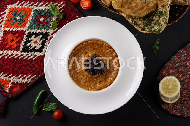 Traditional traditional Saudi food, a picture from above of the freekeh ...