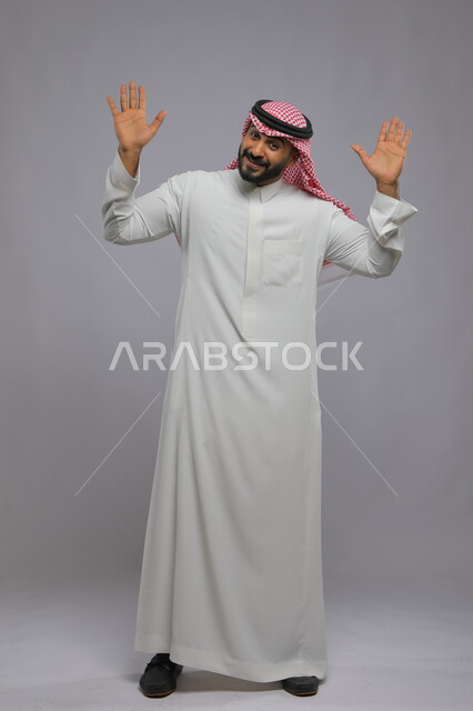 Help and requesting rescue, portrait of a Saudi Gulf Arab man wearing a ...