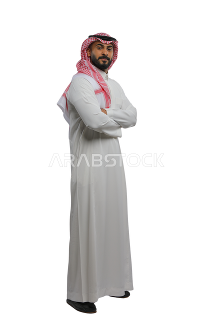 An important Saudi figure, standing with crossed hand movements, paying ...
