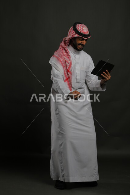 Using technology and tablet programs, cheering for the Saudi national ...
