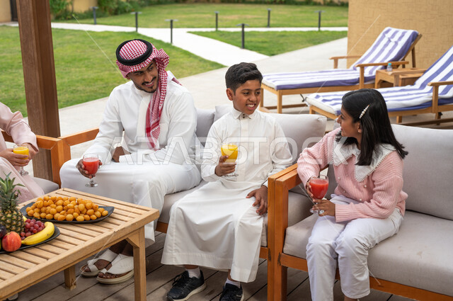 Drinking cold summer drinks, being happy and enjoying family ...