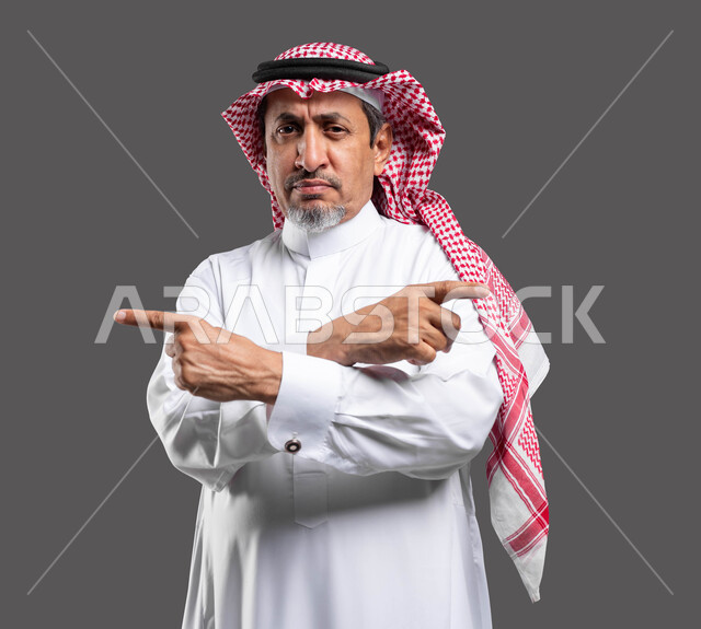 Pointing to two opposite sides, expressions of seriousness and firmness ...