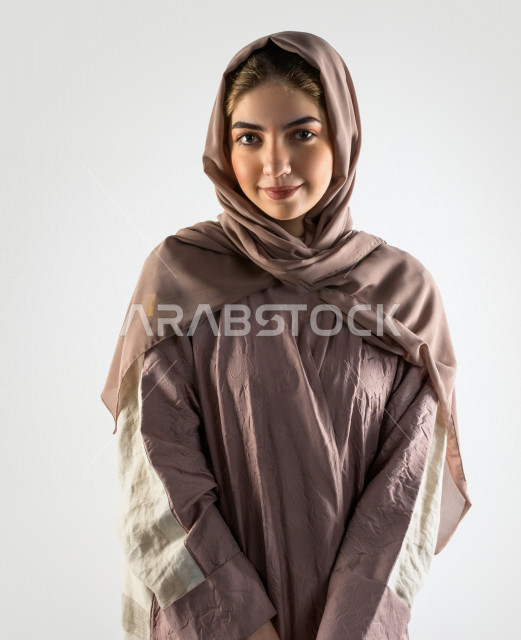 Portrait of a happy Saudi Arabian Gulf woman with different face and ...