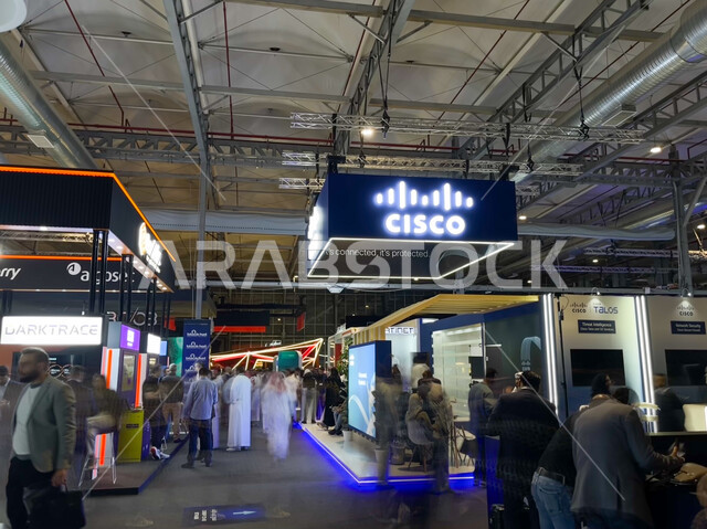 Crowded visitors in the corridors of the Black Hat Cybersecurity ...