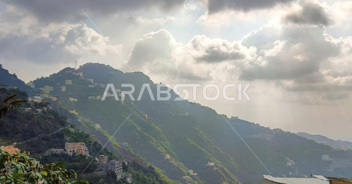 Houses and residential buildings on the mountain peaks and heights in ...