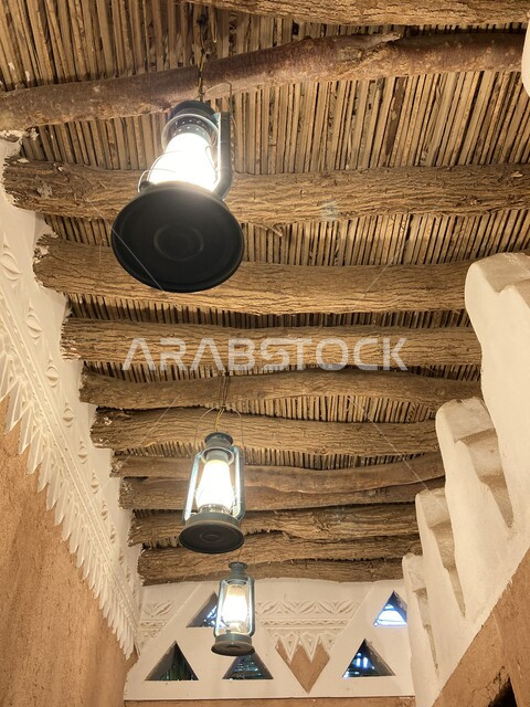 A popular ceiling lamp inside the Al-Uqailat Museum in the city of ...
