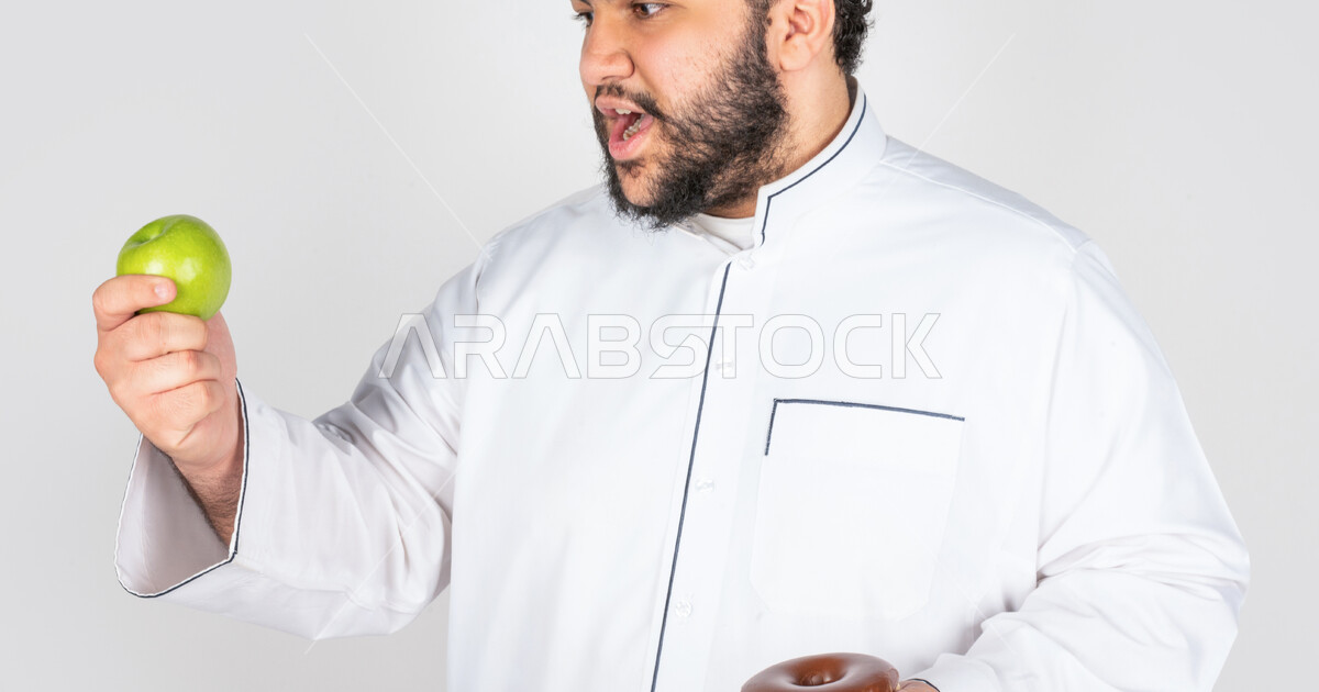 Portrait of a fat young Saudi Arabian Gulf man who is the best between ...