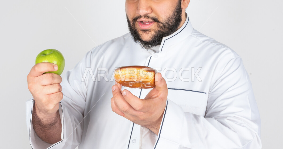 Portrait of a fat young Saudi Arabian Gulf man who is the best between ...