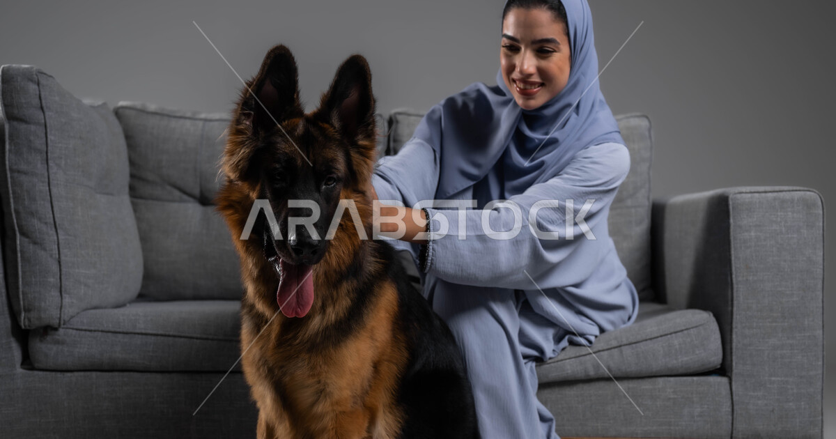 Acquiring pets, a portrait of a smiling Saudi Arabian Gulf woman ...