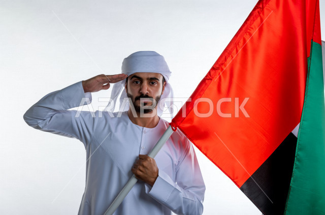 An Emirati man celebrates the National Day of the United Arab Emirates ...