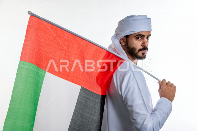 An Emirati man celebrates the National Day of the United Arab Emirates ...