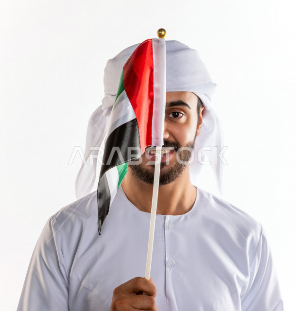 An Emirati man celebrates the National Day of the United Arab Emirates ...