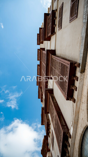 A view of the blue sky above the ancient buildings in the historic Al ...
