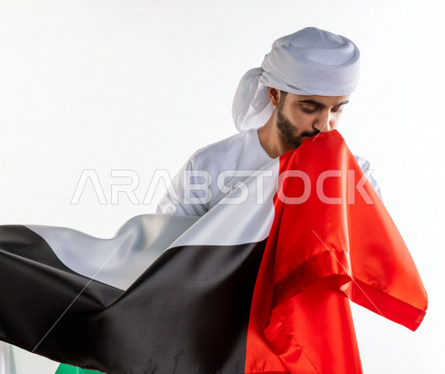 An Emirati man celebrates the National Day of the United Arab Emirates ...