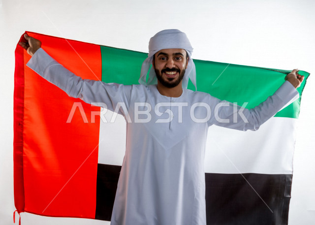 An Emirati man celebrates the National Day of the United Arab Emirates ...