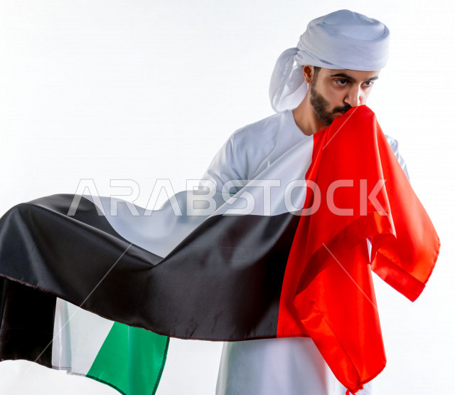 An Emirati man celebrates the National Day of the United Arab Emirates ...