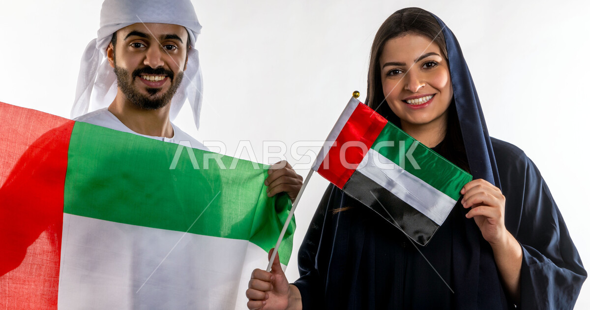 An Emirati couple celebrates the national day of the United Arab ...