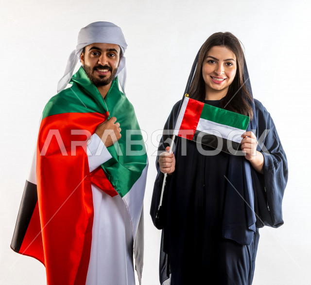 An Emirati couple celebrates the national day of the United Arab ...
