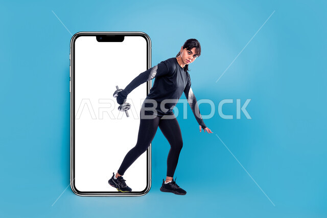 Weight lifting exercises (dumbbells), portrait of a Saudi Arabian Gulf ...