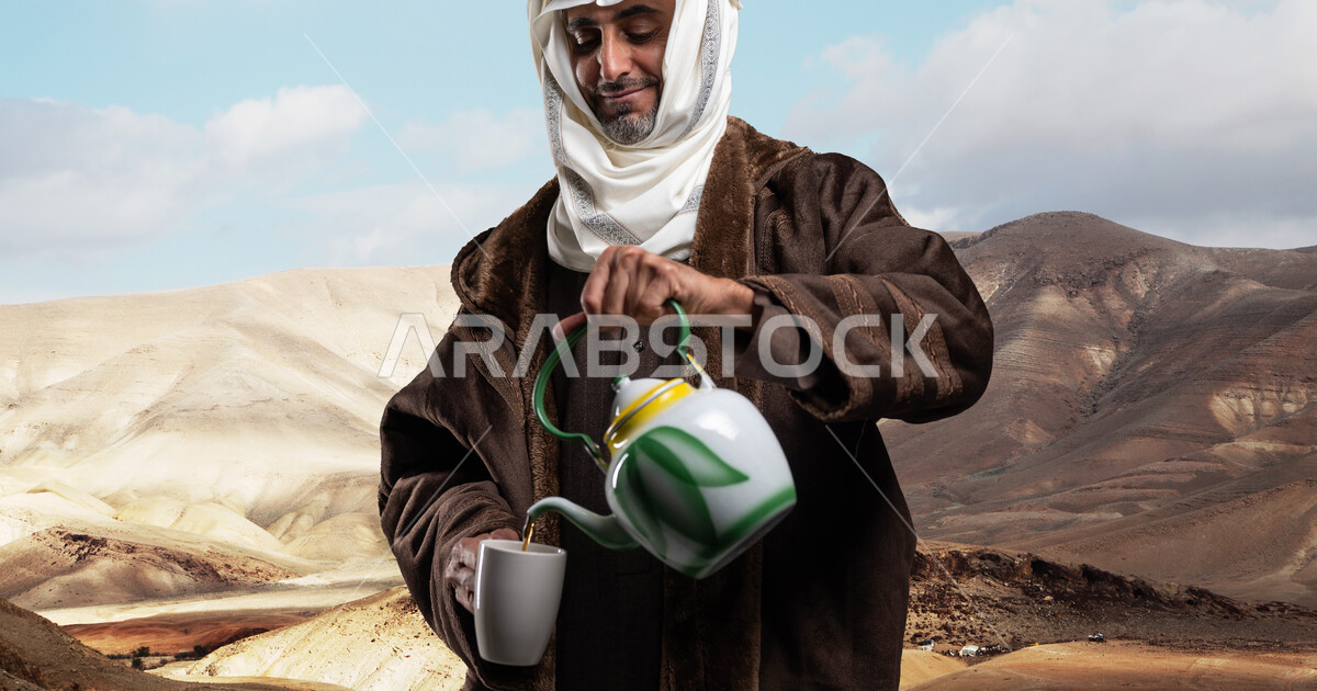 Youthful Kashta in the desert, enjoying hot drinks and herbs in the ...